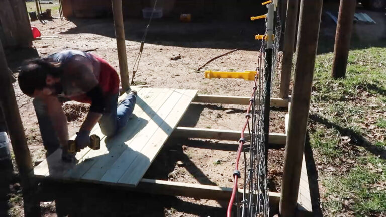 DIY Structure to Keep Feed Hay Dry Outside (Without a Barn) - Roots and ...